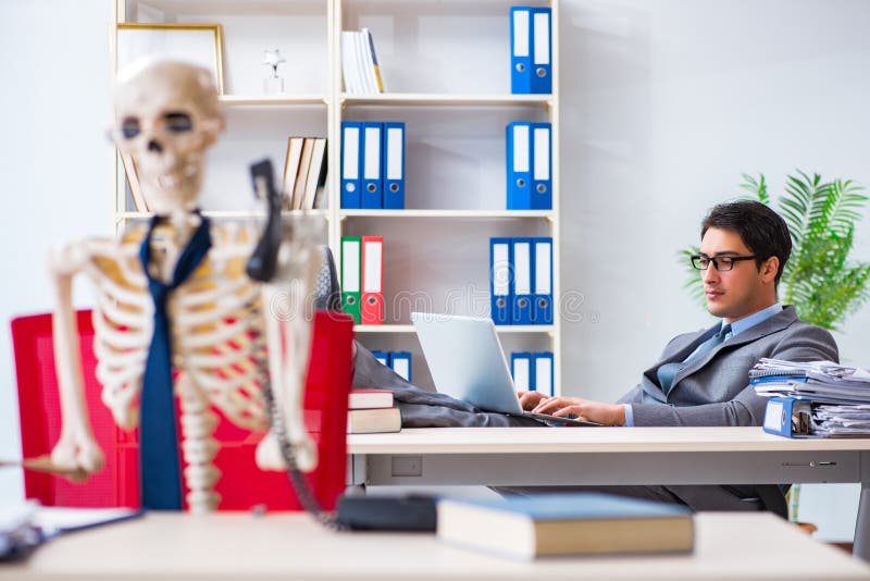 The Businessman Working with Skeleton in Office Stock Image - Image of ...