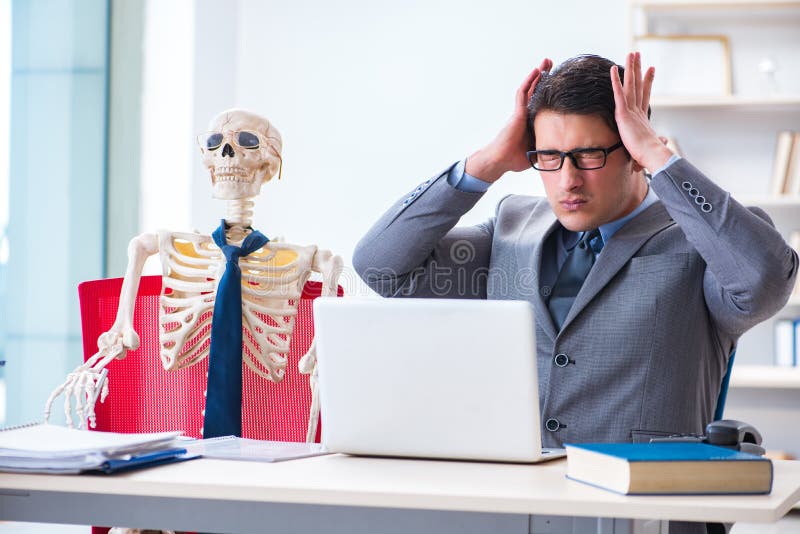 The Businessman Working with Skeleton in Office Stock Photo - Image of ...