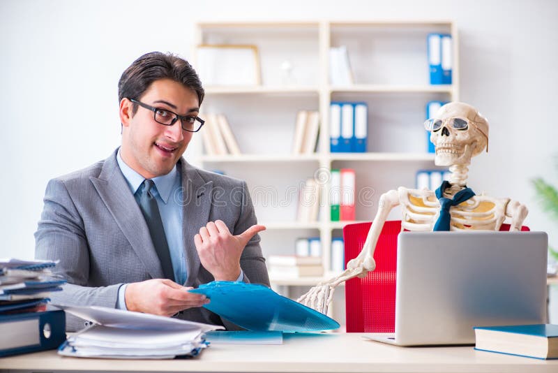 The Businessman Working with Skeleton in Office Stock Image - Image of ...