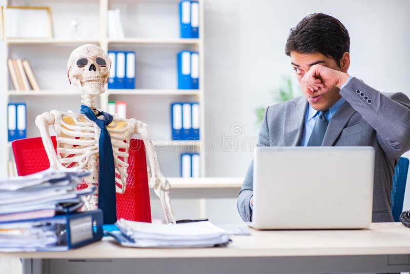 The Businessman Working with Skeleton in Office Stock Photo - Image of ...