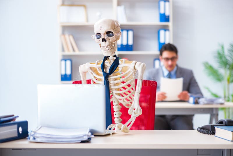 The Businessman Working with Skeleton in Office Stock Photo - Image of ...