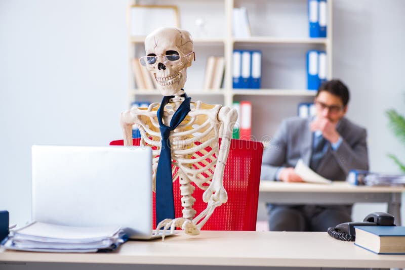 The Businessman Working with Skeleton in Office Stock Photo - Image of ...