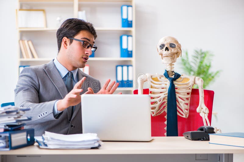 The Businessman Working with Skeleton in Office Stock Image - Image of ...