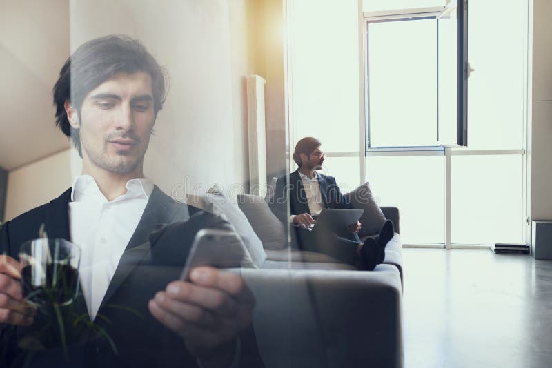 Businessman Works with His Smartphone in Office. Double Exposure. Stock ...