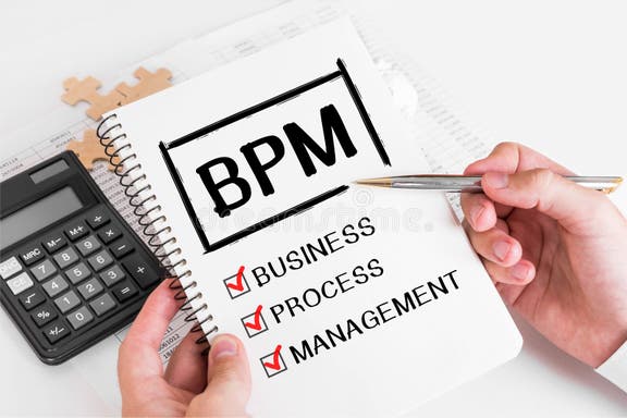 Businessman Writing BPM Concepts on His Note Stock Photo - Image of ...
