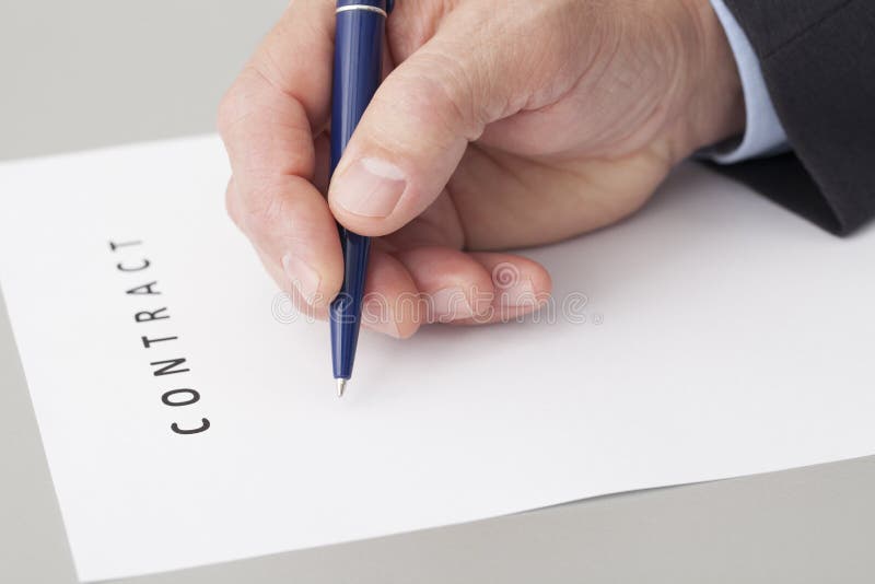 Businessman Writing a Contract Stock Photo - Image of signing, creating ...