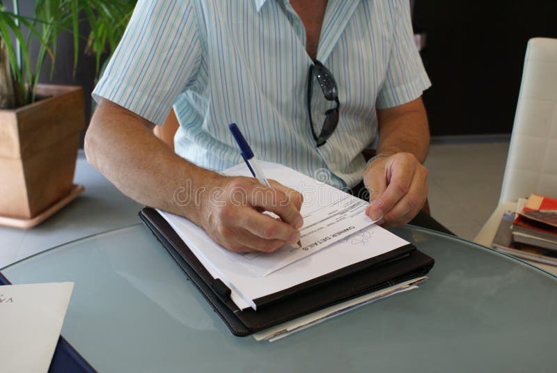 124 Employee Completing Paperwork Stock Photos - Free & Royalty-Free ...