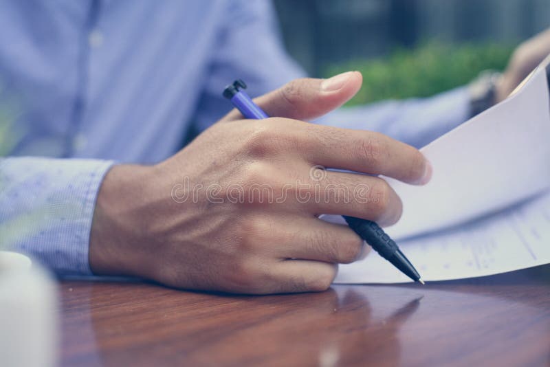 Businessman Writing Document. Stock Photo - Image of people ...