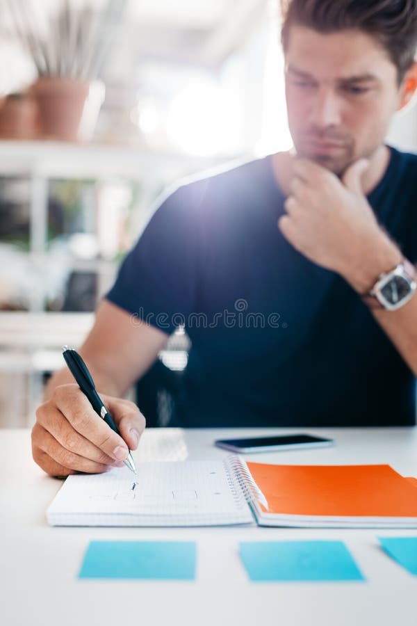 Businessman Writing Down Important Notes in Office Diary Stock Image ...