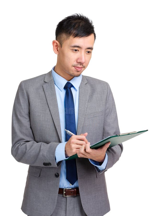 Businessman Writing on Folder Stock Image - Image of marketing ...