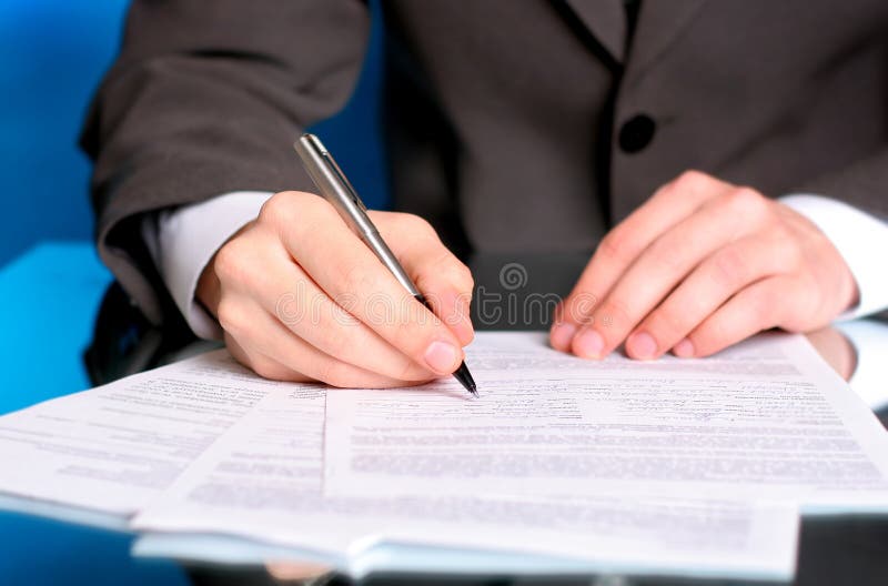 Businessman Writing on a Form Stock Image - Image of form, banking: 3923935