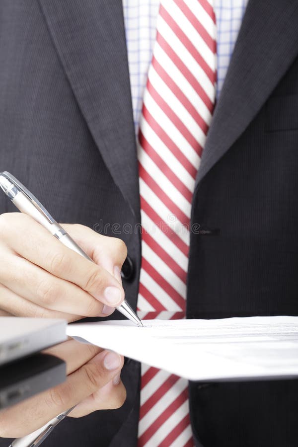 Businessman Writing on a Form Stock Photo - Image of filling, signing ...
