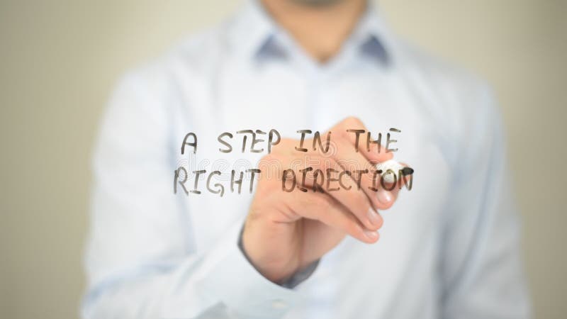 A Step in the Right Direction , Man Writing on Transparent Wall Stock ...