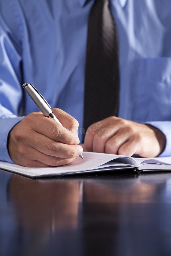 Businessman Signing or Writing a Document Stock Image - Image of deal ...