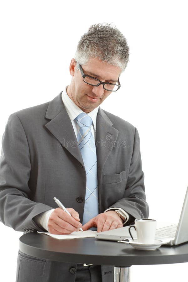 Businessman writing notes stock photo. Image of employment - 11396202