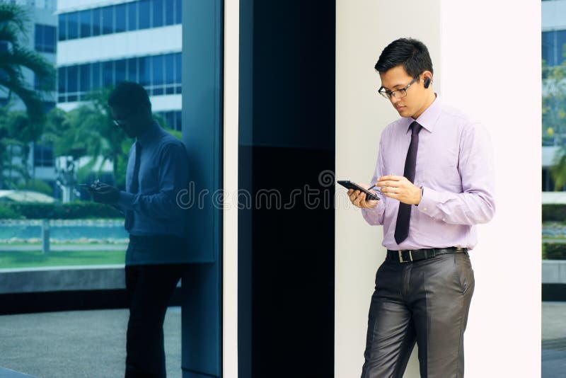 Businessman Writing with Pen on Mobile Phone Display-3 Stock Photo ...