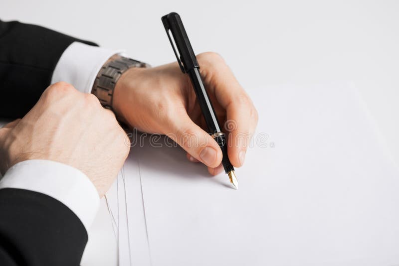 Businessman Writing Something on the Paper Stock Photo - Image of ...