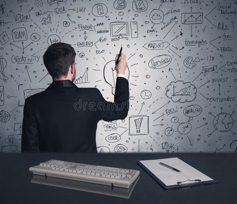 Businessman Writing Strategy Plan on Wall Stock Photo - Image of ...