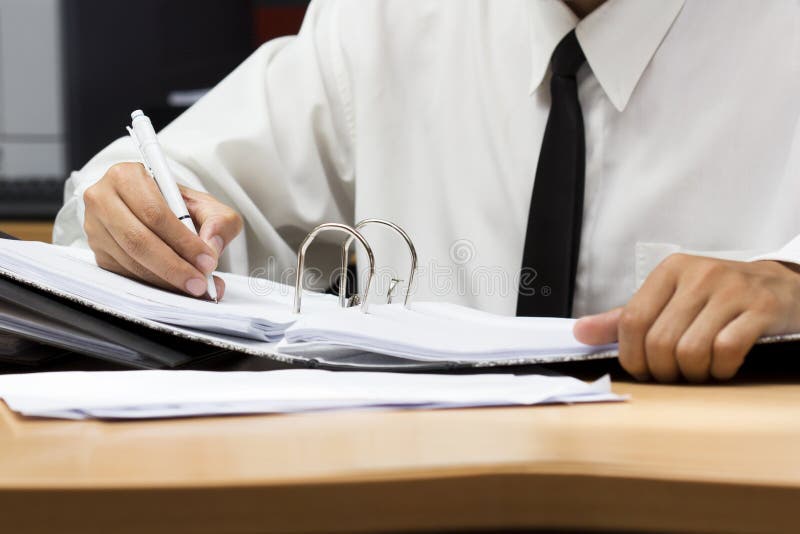 Businessman Writing Work Paper Stock Image - Image of male, sitting ...