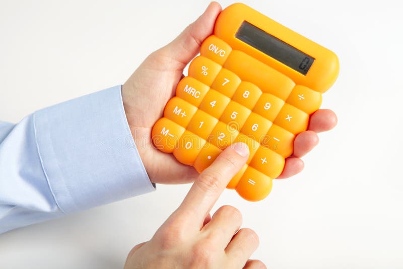 The Businessman and Yellow Calculator Stock Photo - Image of white ...