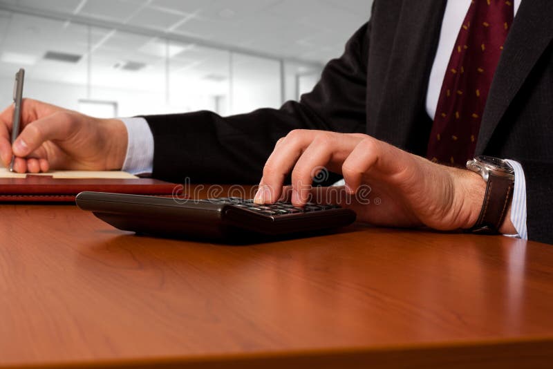 Businessmanworking Working with a Calculator Stock Photo - Image of ...