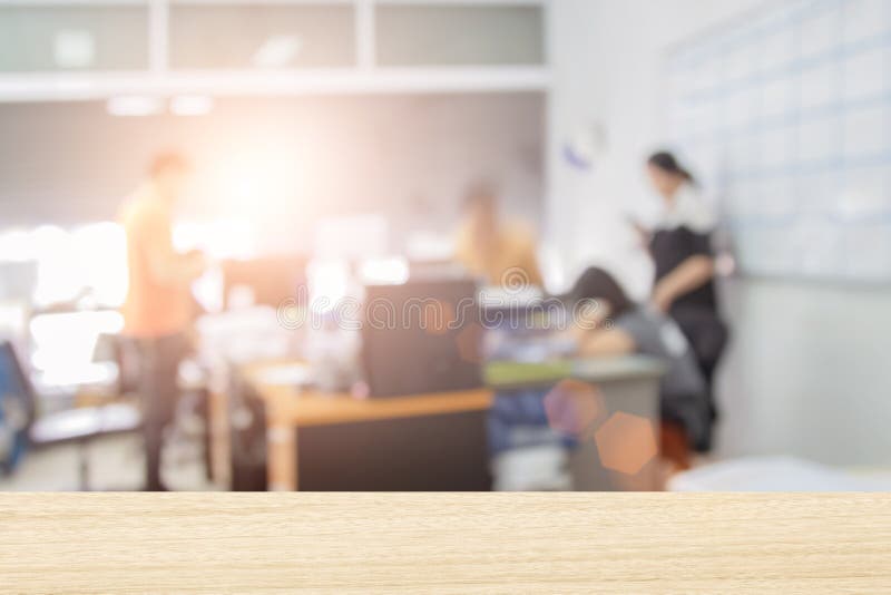 Businessmen Blur in the Workplace or Work Space of Laptop on Table in ...