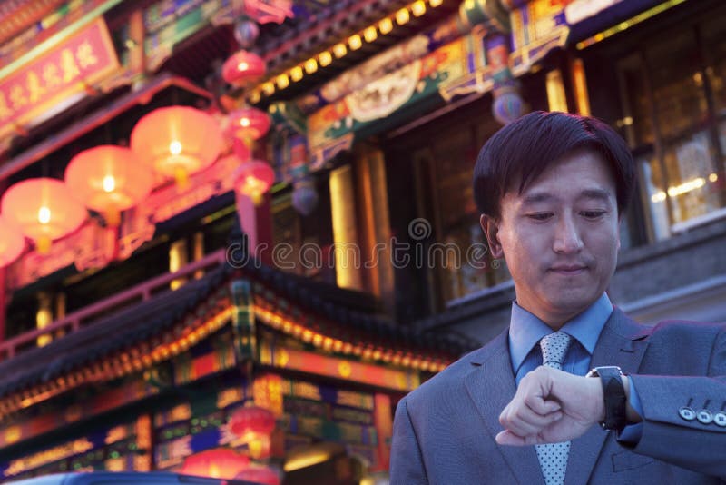 Businessmen Checking His Watch. Stock Photo - Image of horizontal ...