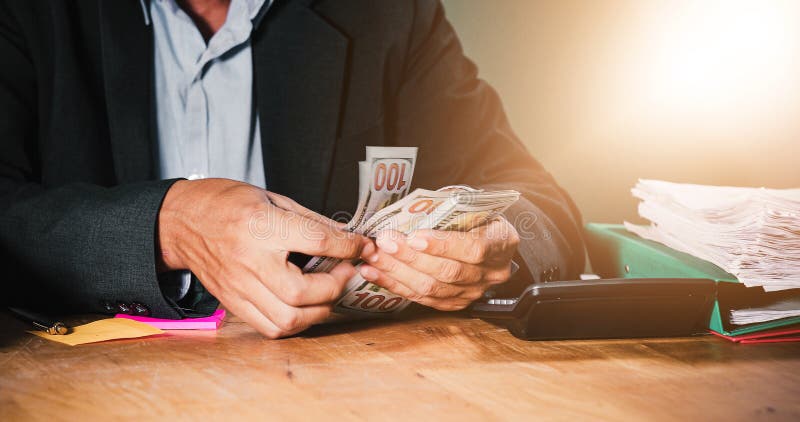 Businessmen Count Money and Plan Finances for Projects and Use ...