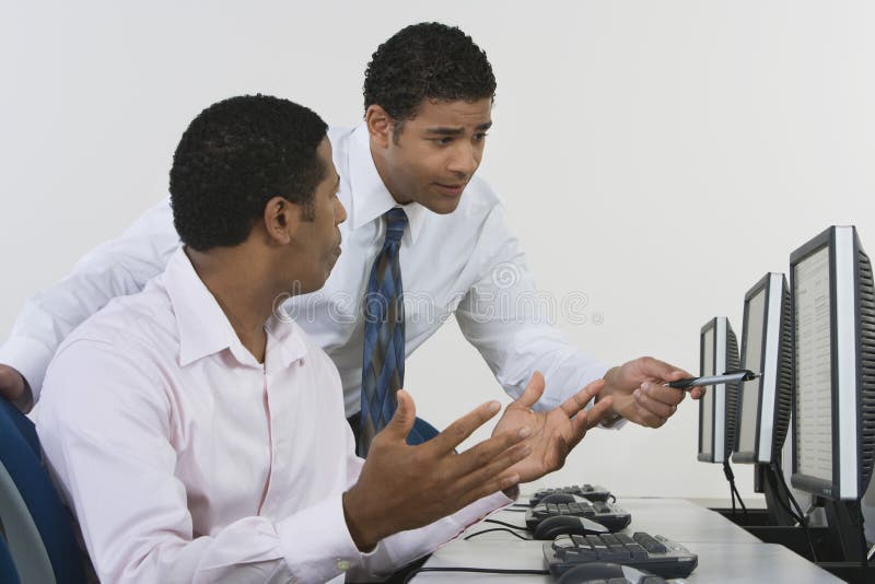 Businessmen Discussing in Computer Lab Stock Image - Image of colleague ...