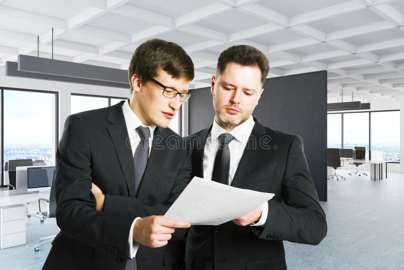 Businessmen Discussing Contract Stock Photo - Image of indoors, design ...