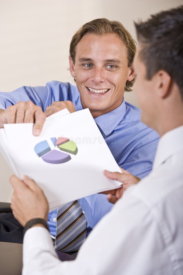 Businessmen Discussing Annual Report Chart Stock Image - Image of ...