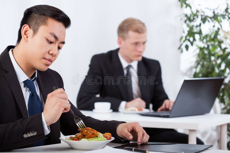 Businessmen Eating Healthy Meal in Office Stock Photo - Image of career ...