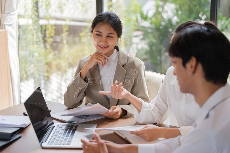 Businessmen Engaging in Productive Discussion and Idea Exchange in ...