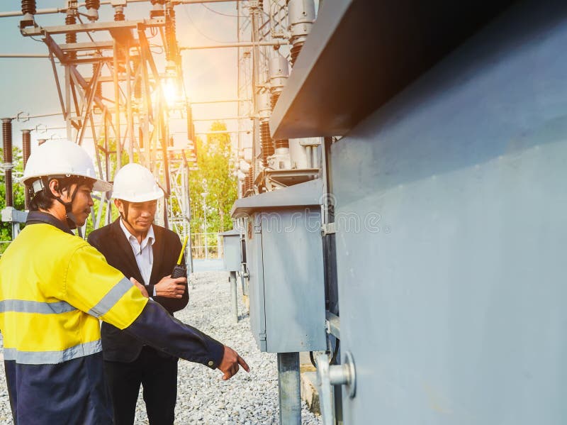 Businessmen and Engineers are Talking about Problems and Electricity ...