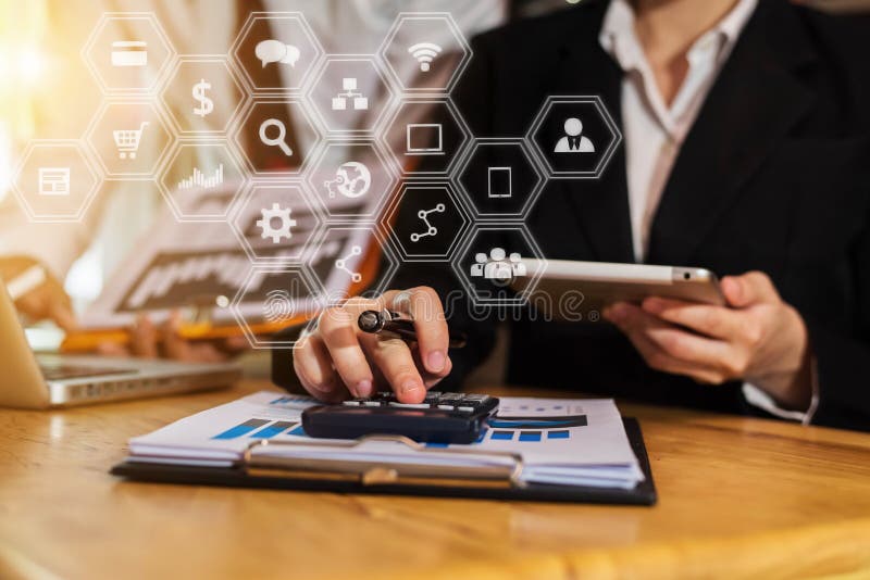 Businessmen or Financial Data Analysts Working with Tablets and Laptop ...