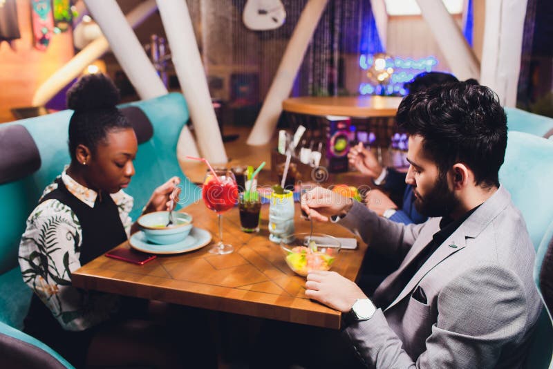 Businessmen Friends Having Fun at the Bar, Drinking Cocktails. Stock ...