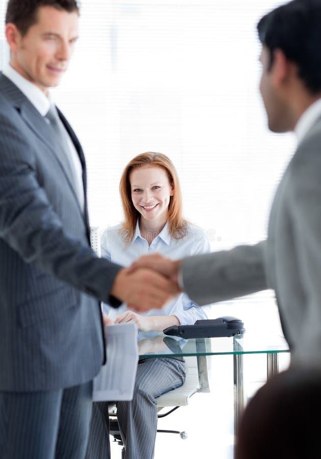 Businessmen Greeting Each Other at a Job Interview Stock Image - Image ...