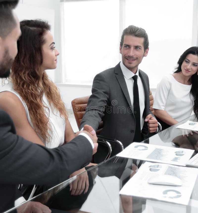 Businessmen Hand Shake, during Meeting Stock Image - Image of paper ...