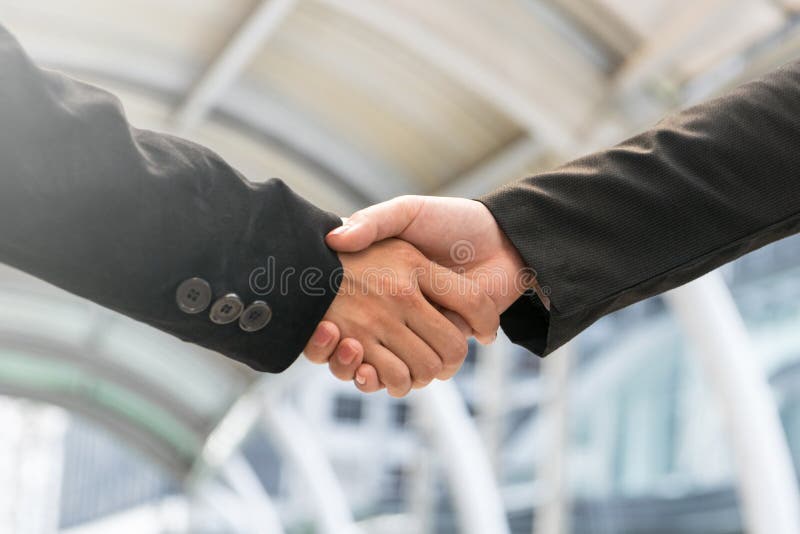Businessmen Handshaking. Business Partnership Stock Photo - Image of ...
