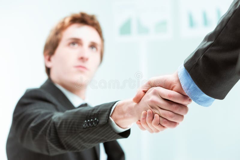 Businessmen Handshaking with Hands in Focus Stock Photo - Image of ...