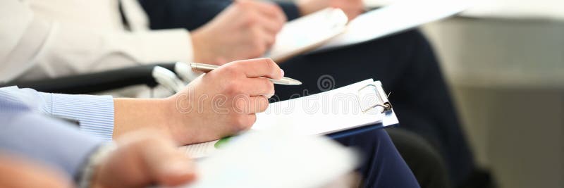 Businessmen are Holding Documents while Taking Notes at Seminar Stock ...
