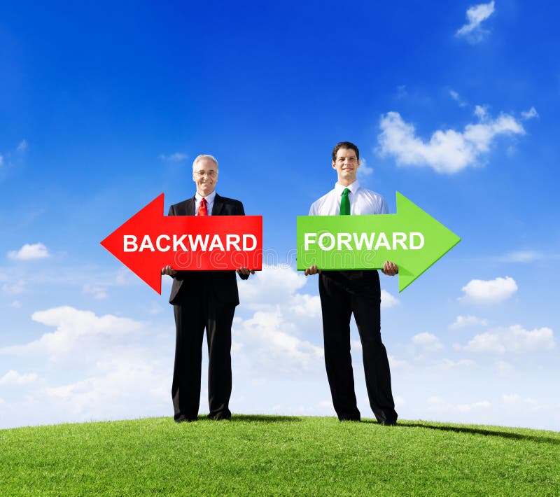 Businessmen Holding Word Backward and Forward Stock Photo - Image of ...