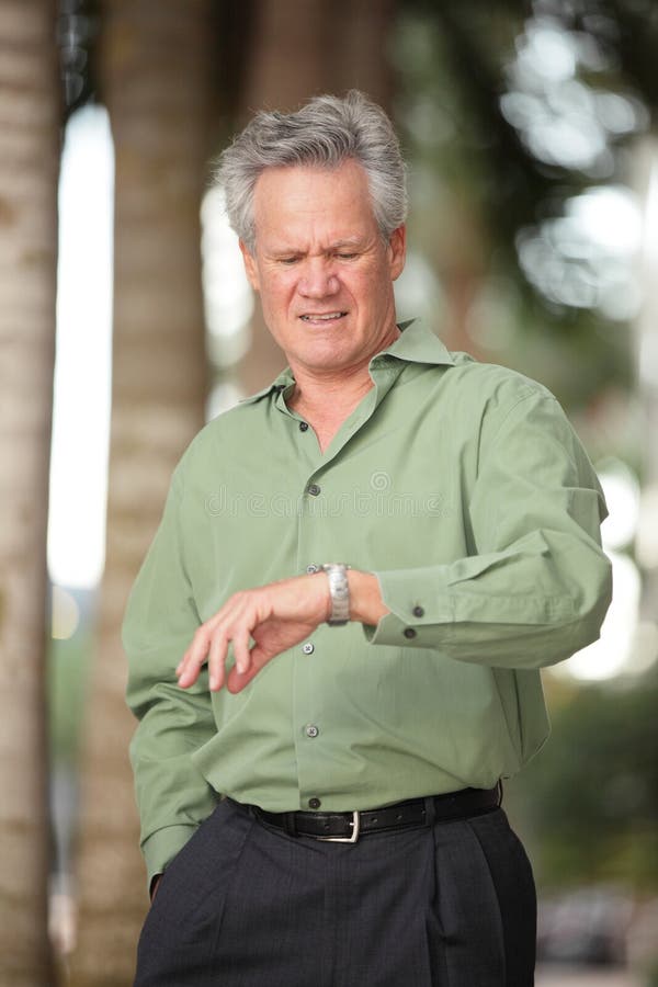 Businessmen Looking at His Watch Stock Image - Image of checking ...