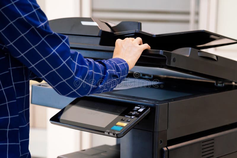 Businessmen Press Button on the Panel for Using Photocopier or Printer ...