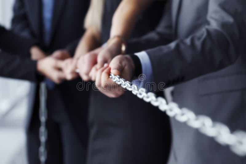 Businessmen pulling chain stock photo. Image of business - 57152554