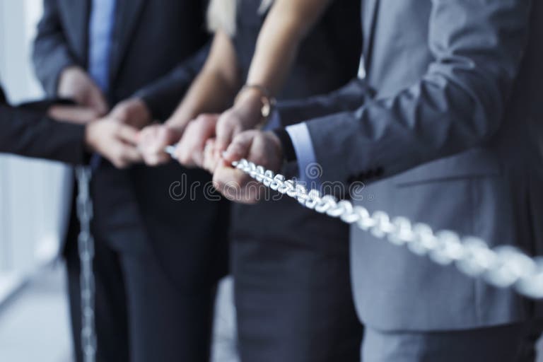 Businessmen pulling chain stock image. Image of steel - 125754805