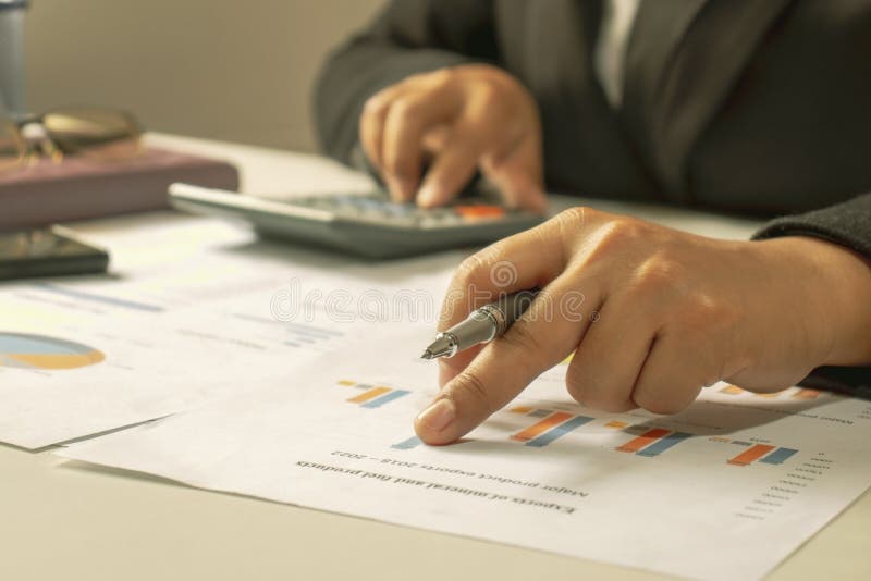 Businessmen are Reviewing Reports, Financial Documents for Financial ...