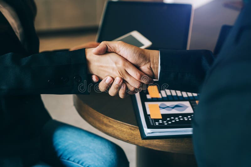 Businessmen Shake Hands To Start a New Project after Consultation Stock ...