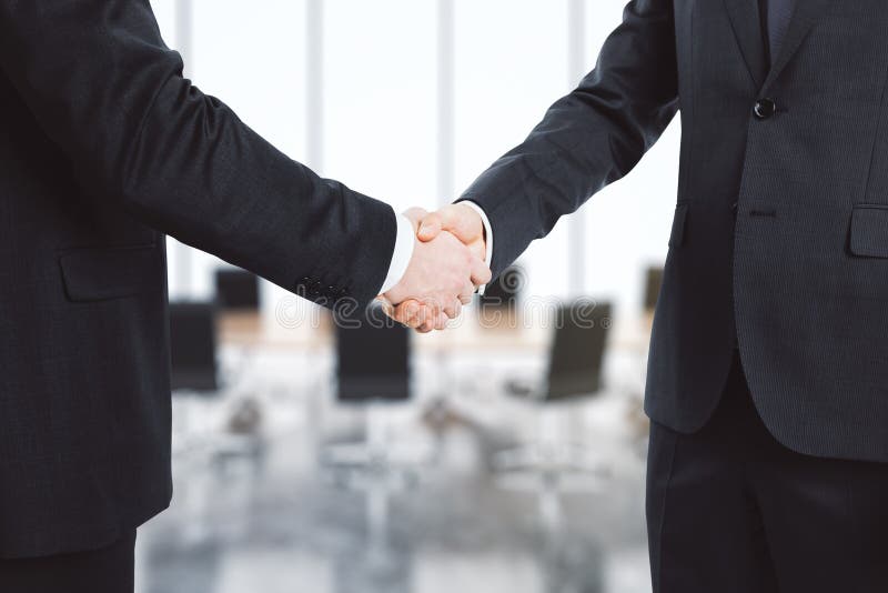 Businessmen Shake Their Hands in Conference Room Stock Photo - Image of ...