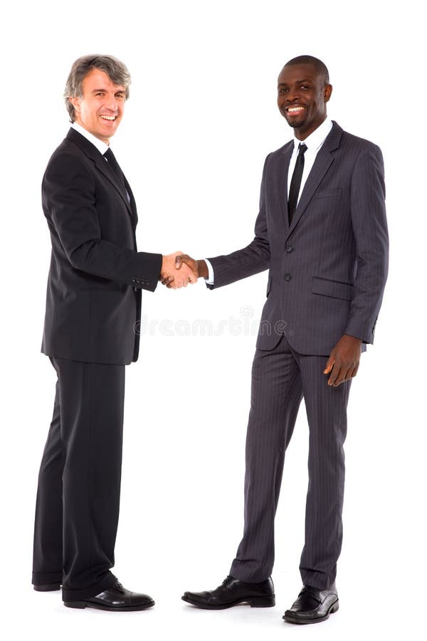 Businessmen Shaking Hands in Front of Corporate Je Stock Photo - Image ...